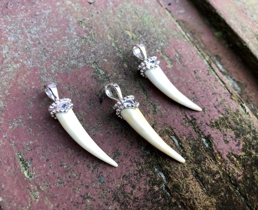 MAMMOTH IVORY PENDANT | Caribou Crossings - Sharing the Heart of Alaska